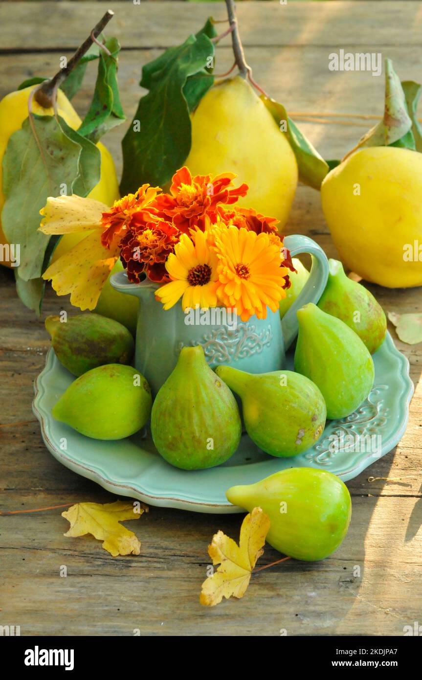 Small bouquet of Pot marigold and French marigold flowers in a small ...
