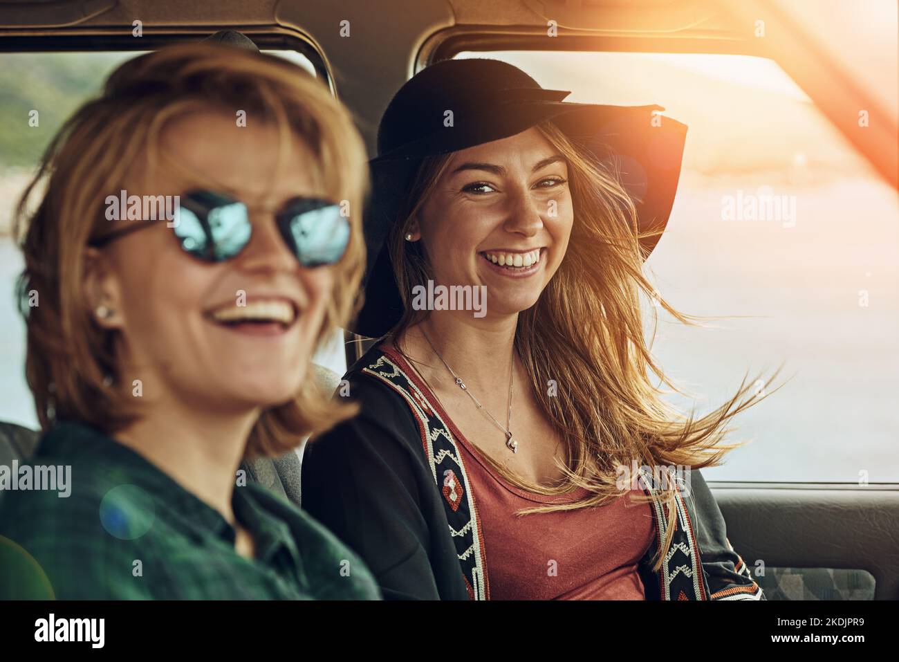 Weekends are for going on adventures. Portrait of two young friends ...