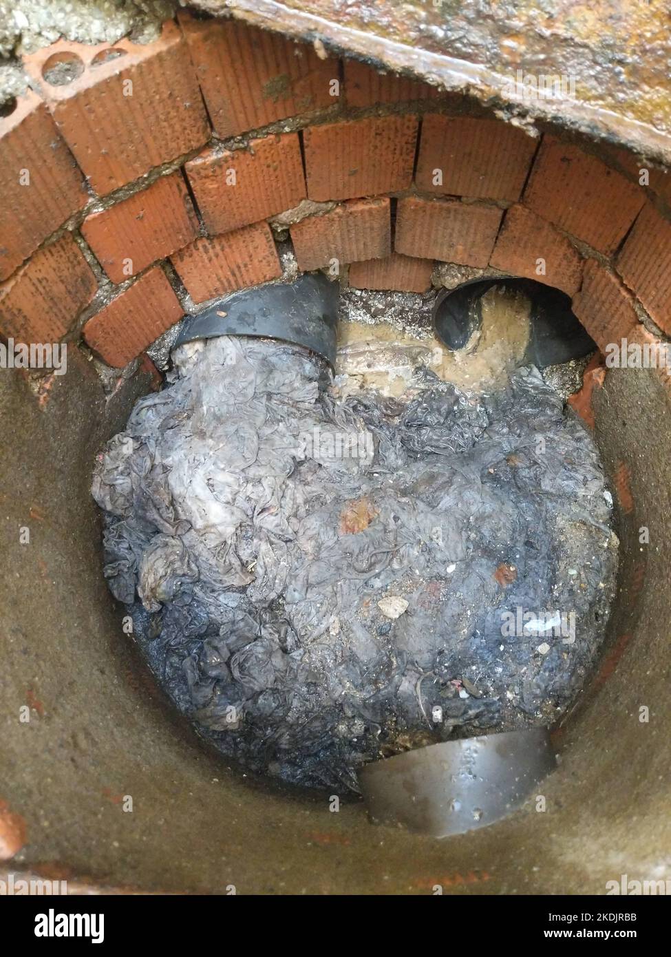 Clogged manhole and building drainage pipes Stock Photo - Alamy