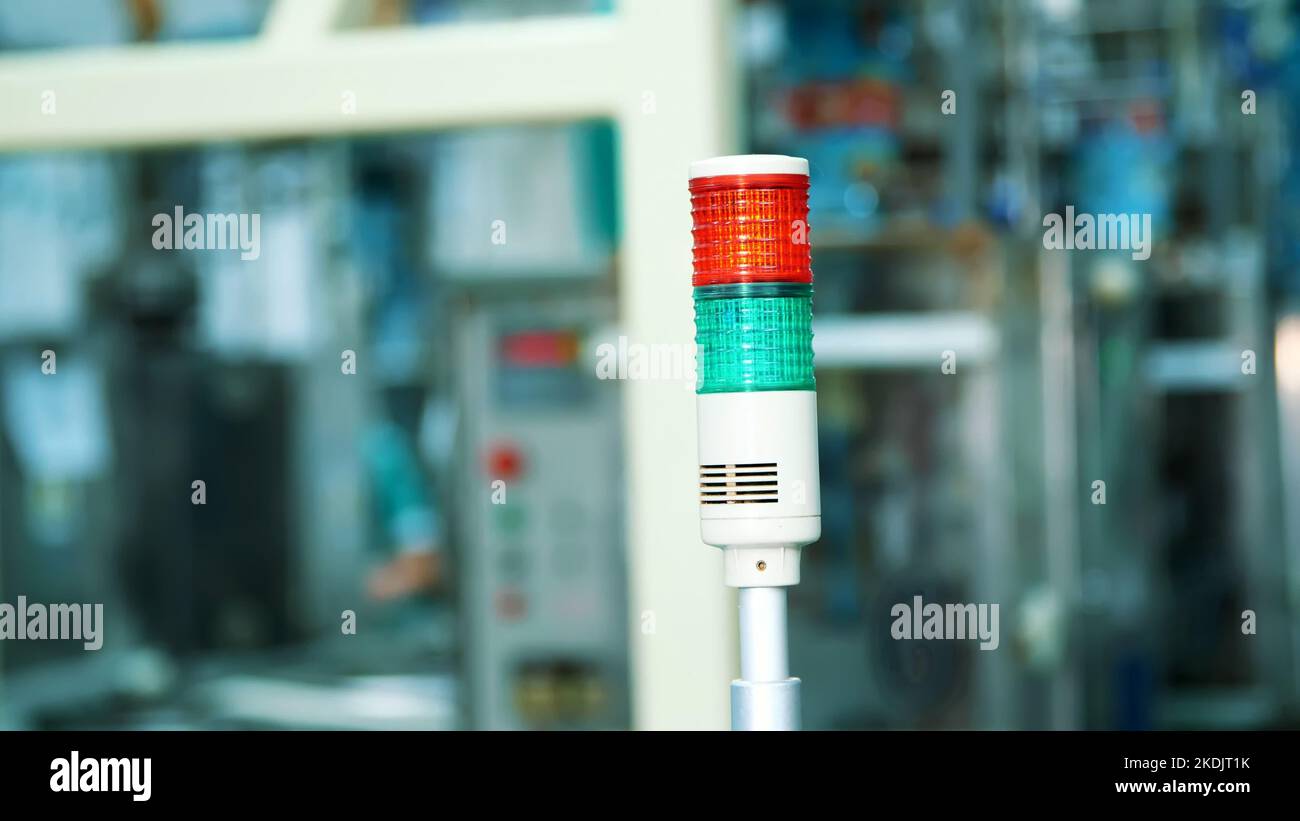 production, workshop, close-up of a special lamp of red and green color ...