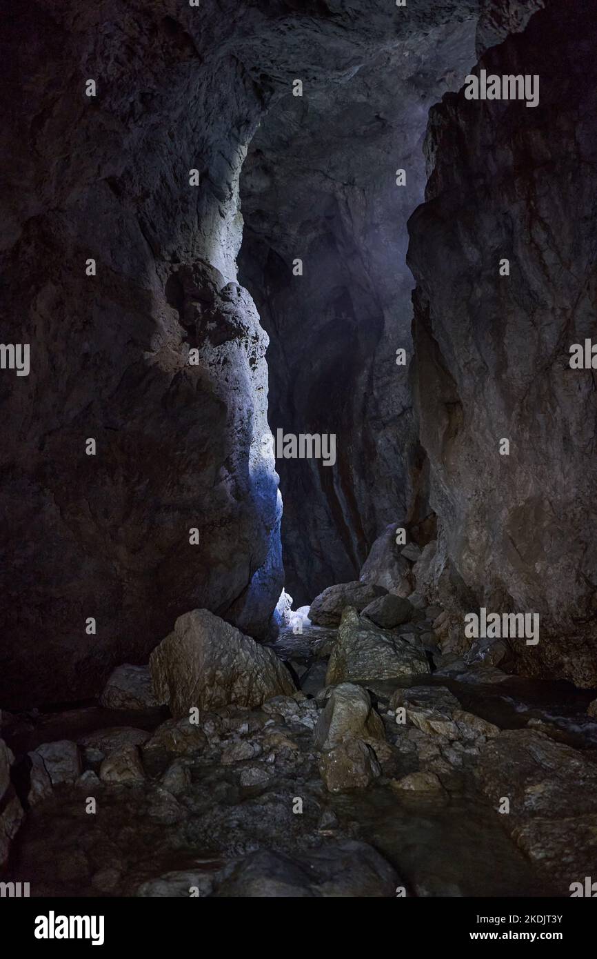 Inside the Cetatile Ponorului cave deep within the karst system, with ...