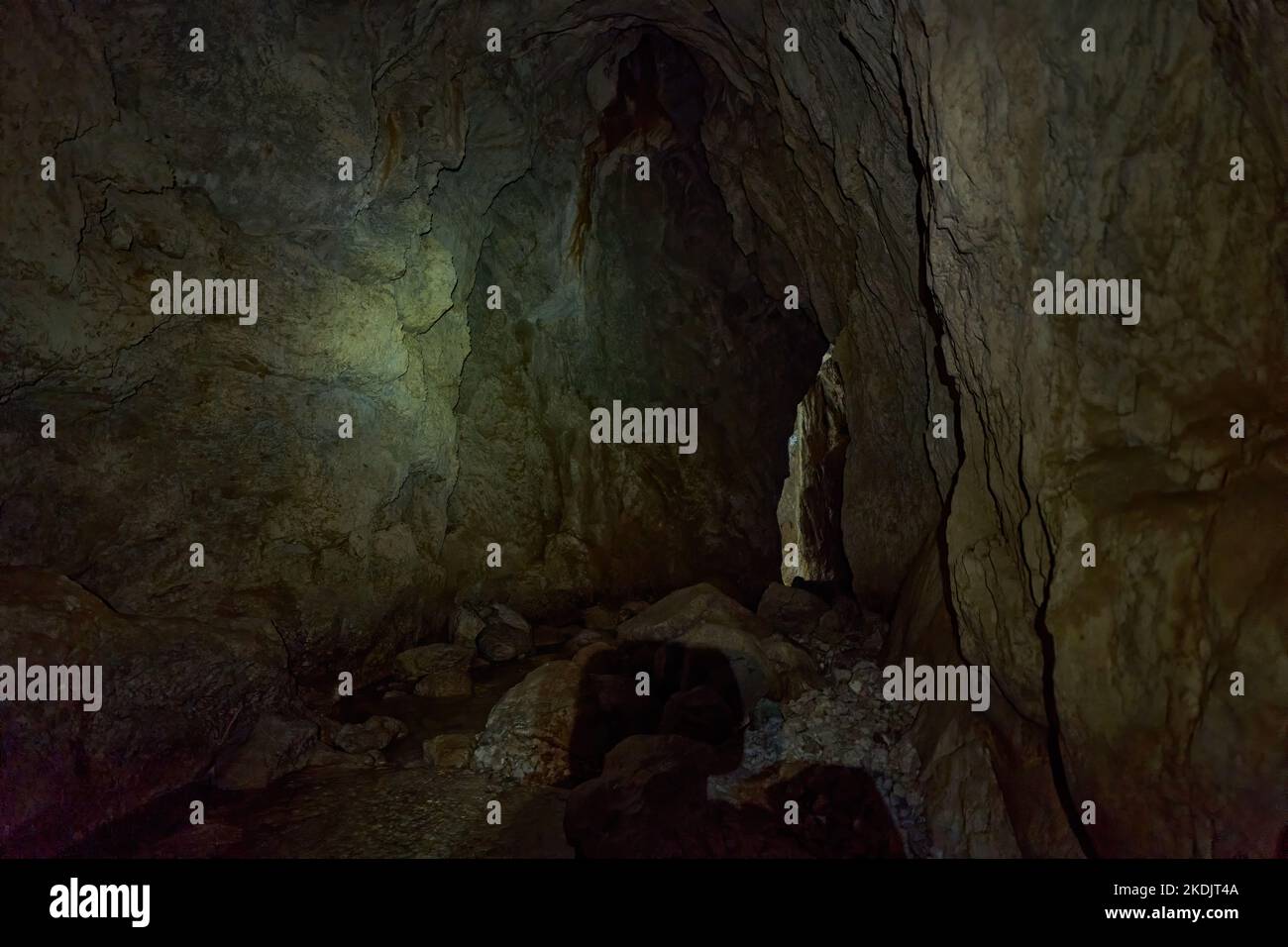 Inside the Cetatile Ponorului cave deep within the karst system, with ...