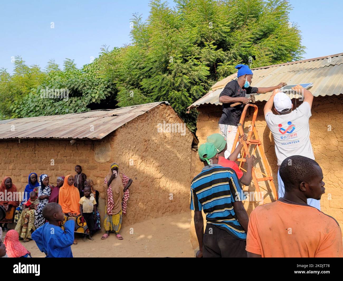 Kano, Nigeria. 4th Nov, 2022. Technicians install a solar light system ...
