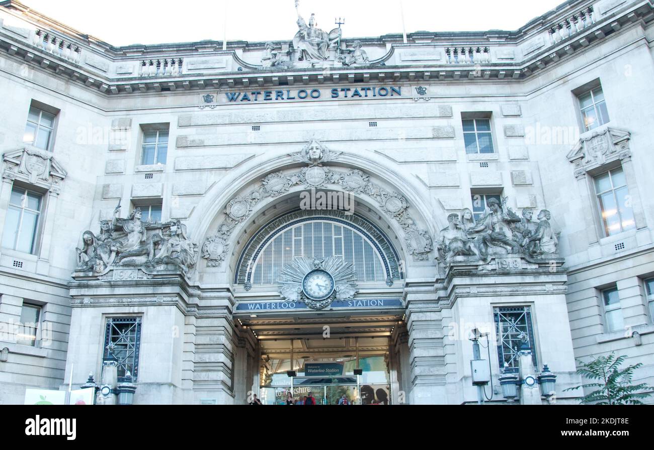Front entrance of Waterloo Train Station, London. People rushing into ...