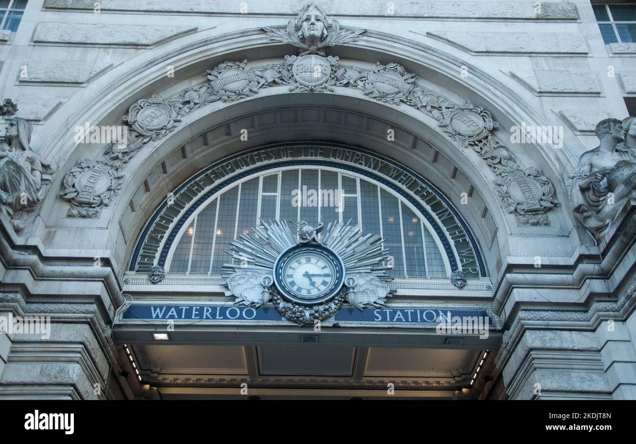 Entrance Waterloo Station, London, carvings and clock above name. This ...