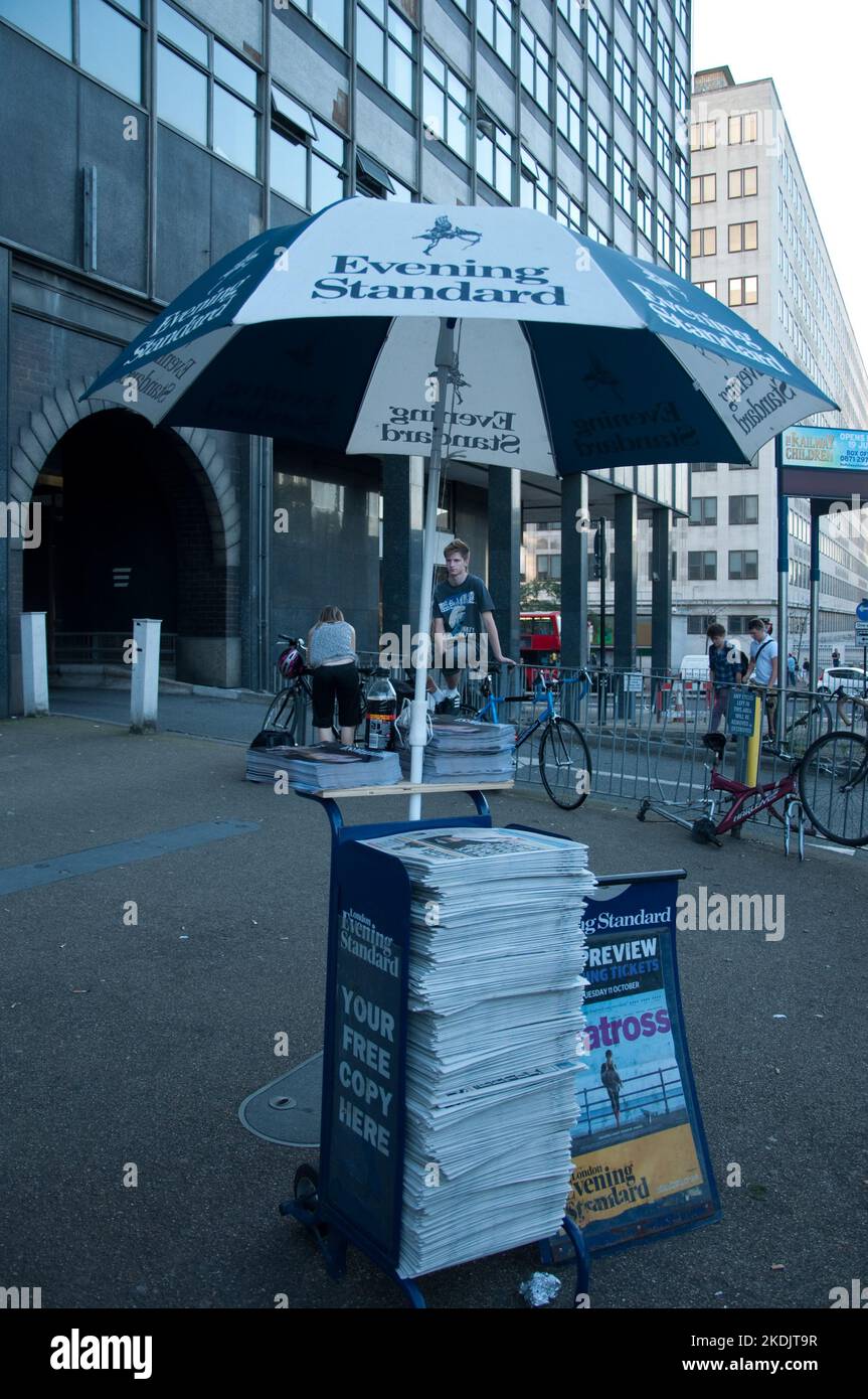 Stand with free copies of the Evening Standard (London local daily ...
