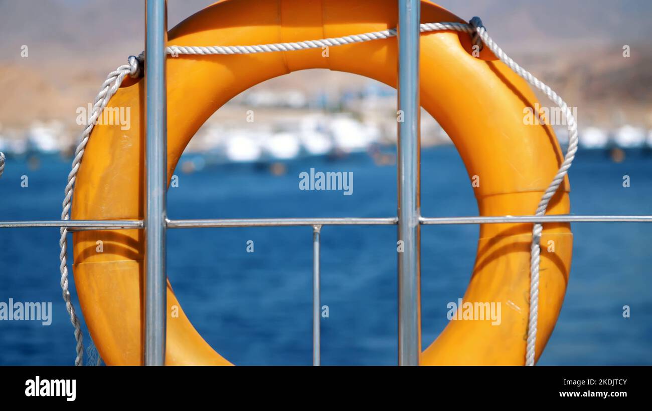 summer, sea, orange lifebuoy, hanging aboard a ferry, ship. special ...