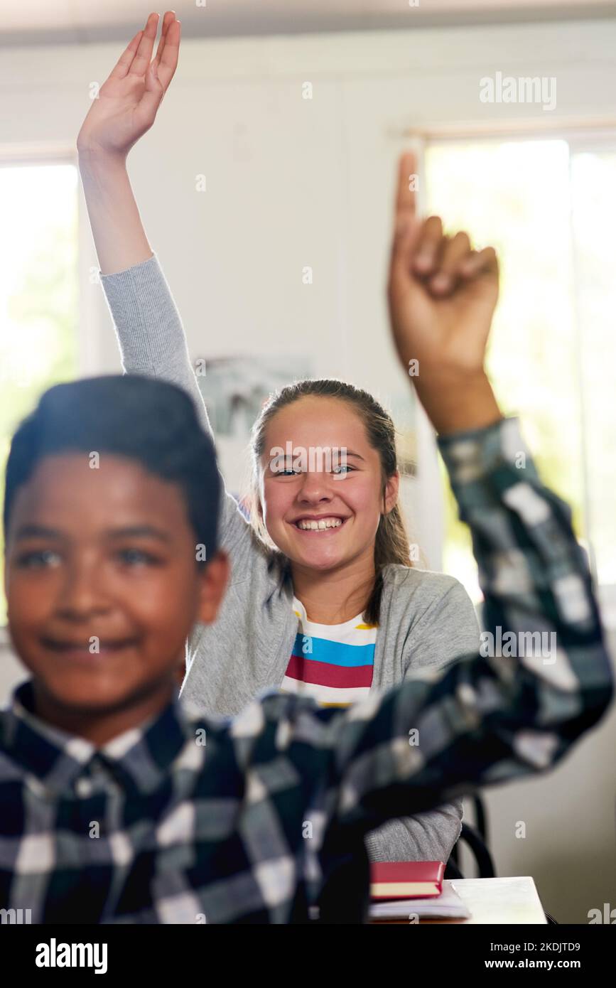 Children raising hands in class hi-res stock photography and images - Alamy