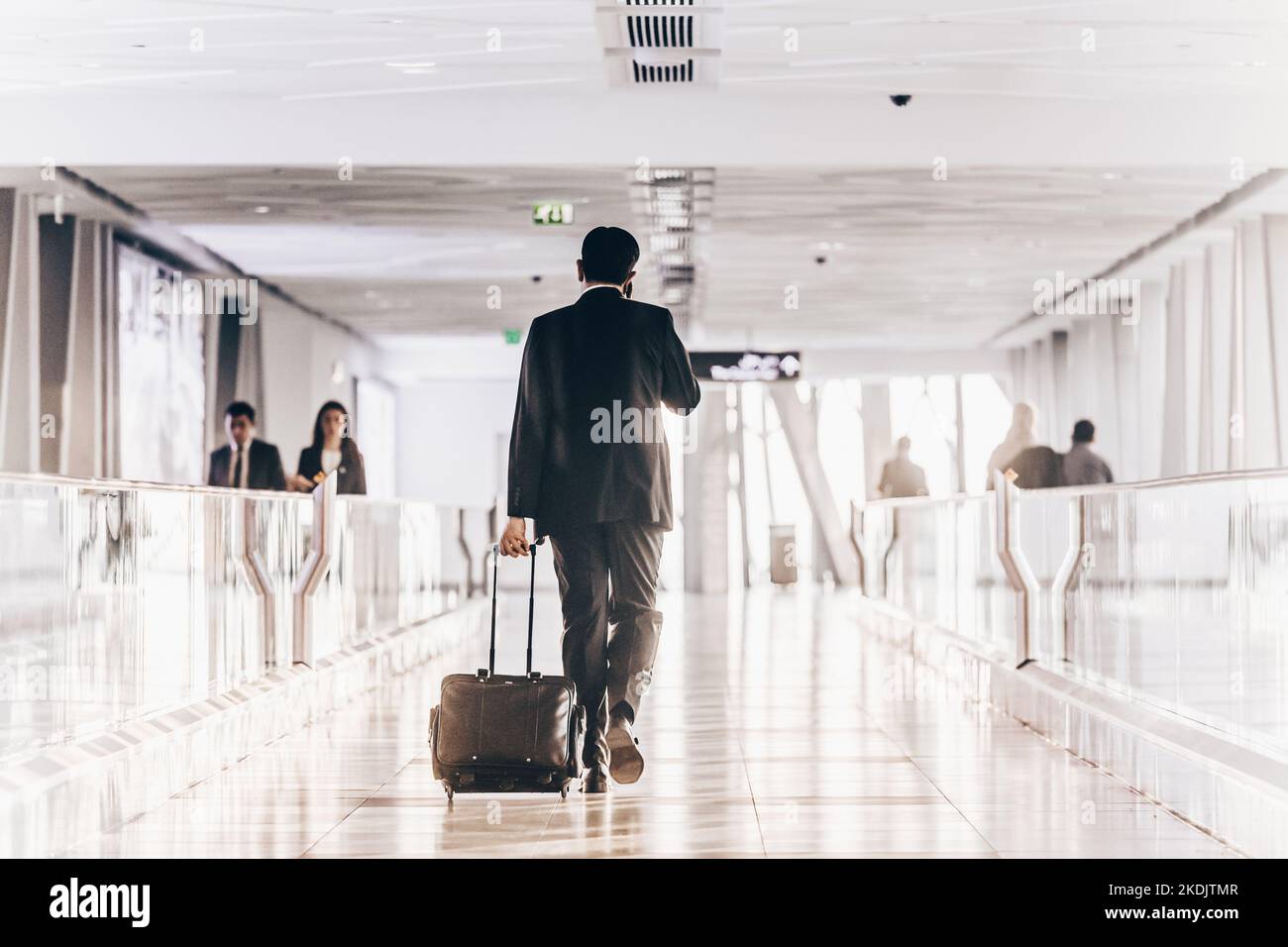 Man dragging bag hi-res stock photography and images - Alamy