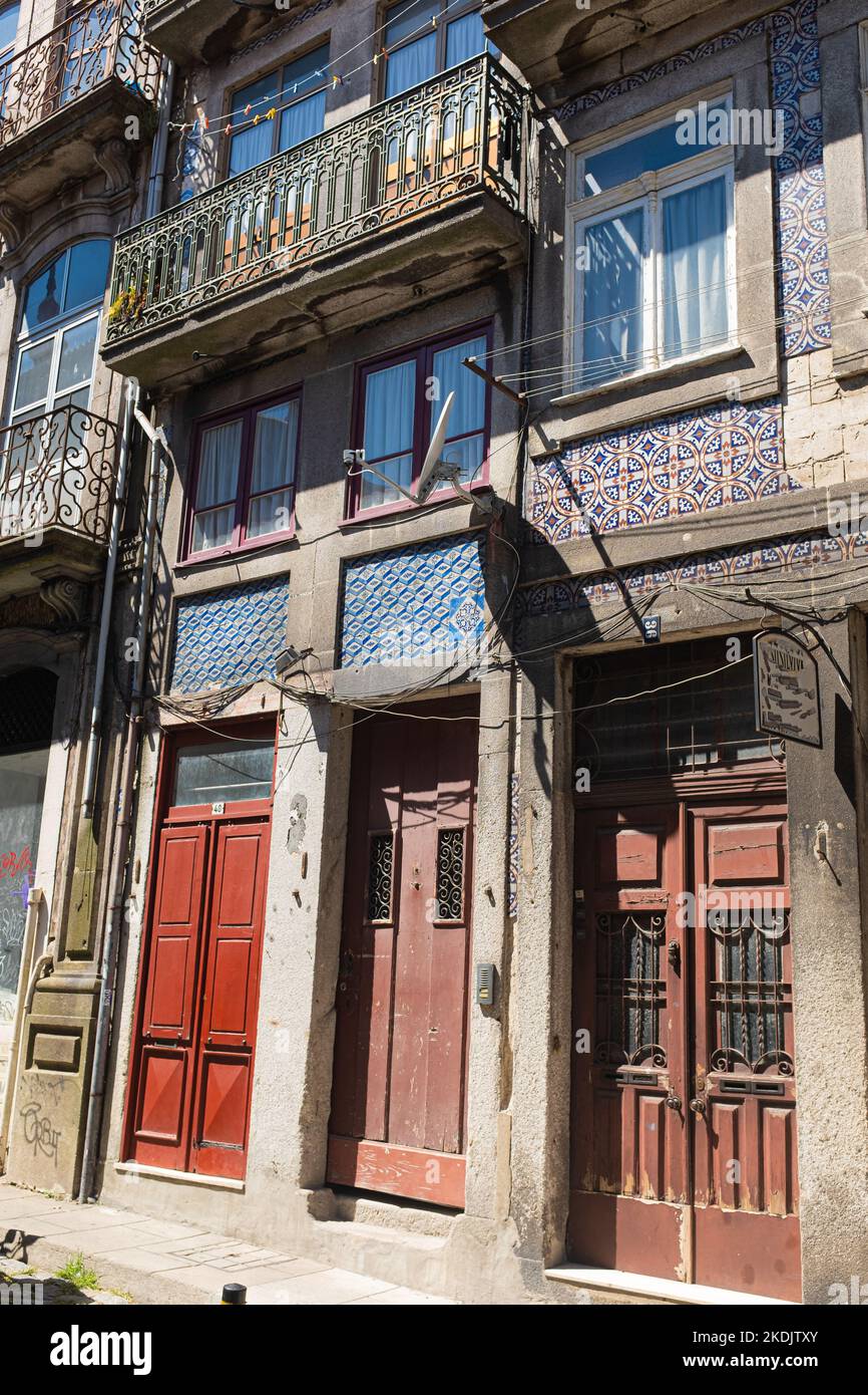 Domestic houses facades with tiled bricks on typical old buildings in ...