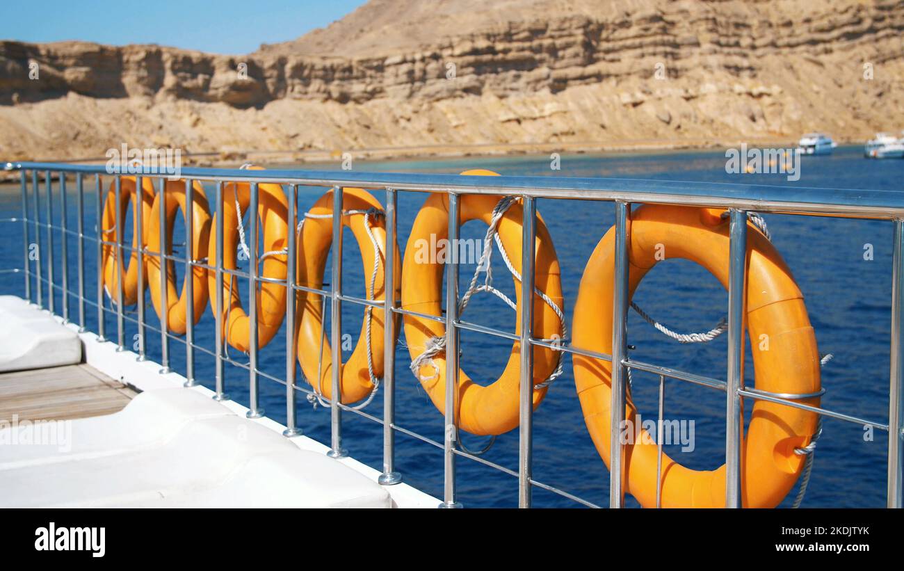 summer, sea, orange lifebuoy, hanging aboard a ferry, ship. special ...