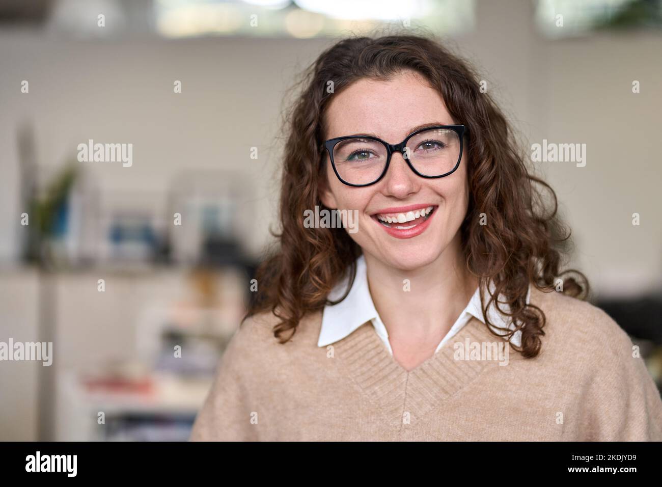 Young happy professional business woman wearing glasses, headshot ...