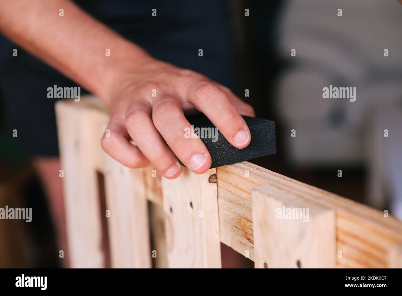 Mans hand repairing renovation hi-res stock photography and images - Alamy