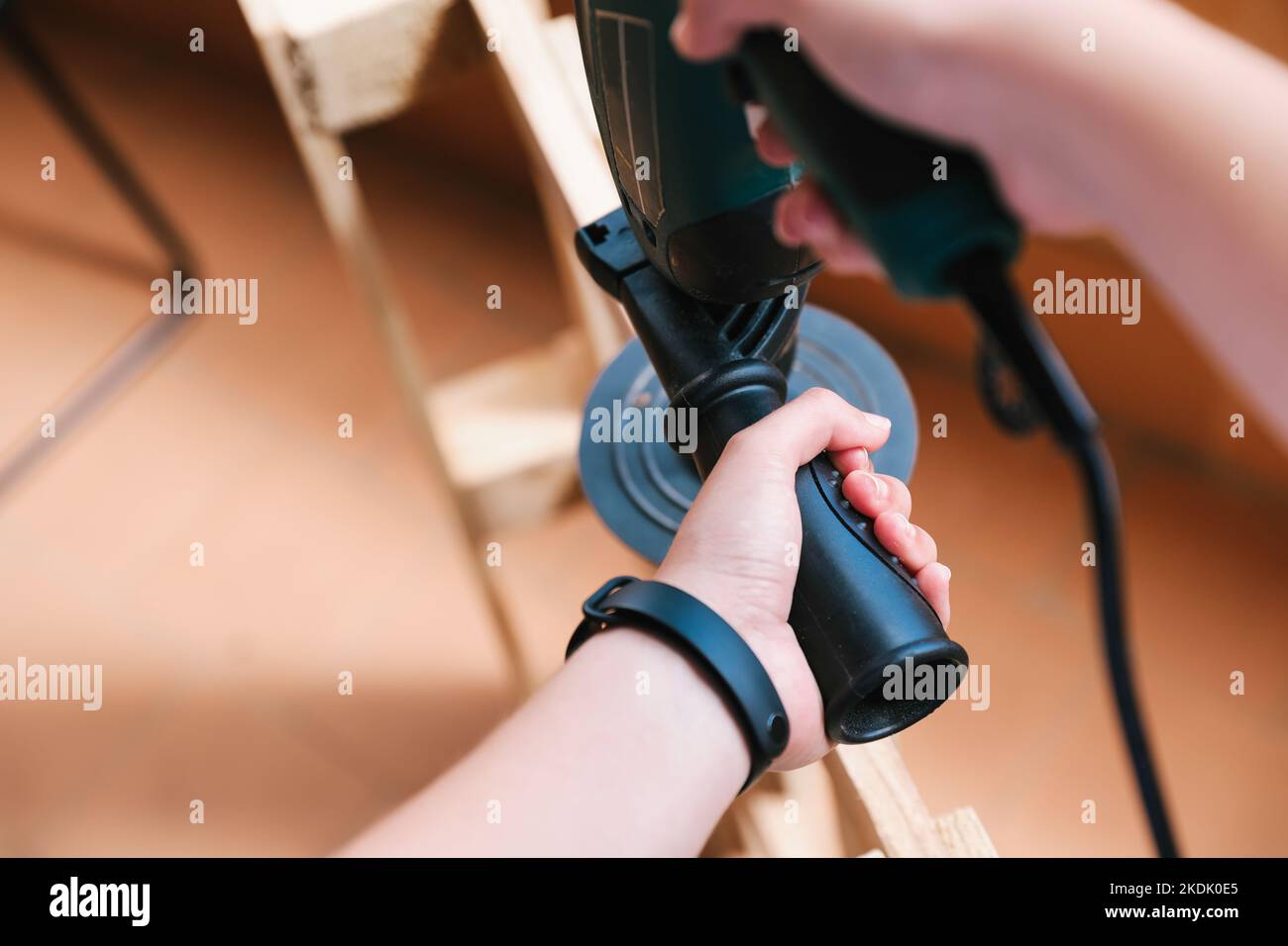Woman industrial sander hi-res stock photography and images - Alamy
