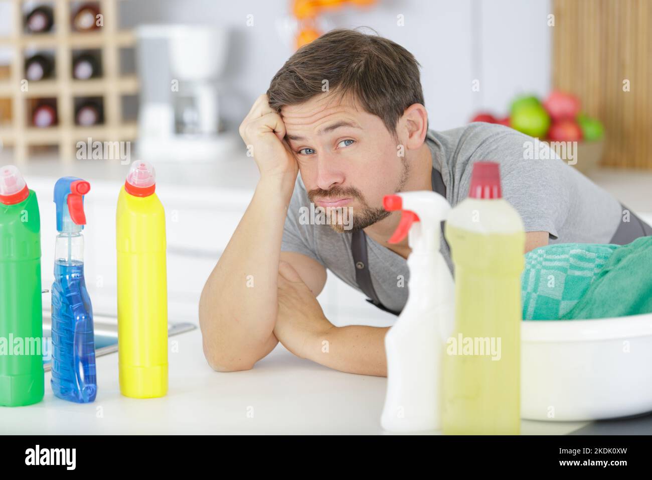 tired man does not want to clean Stock Photo - Alamy