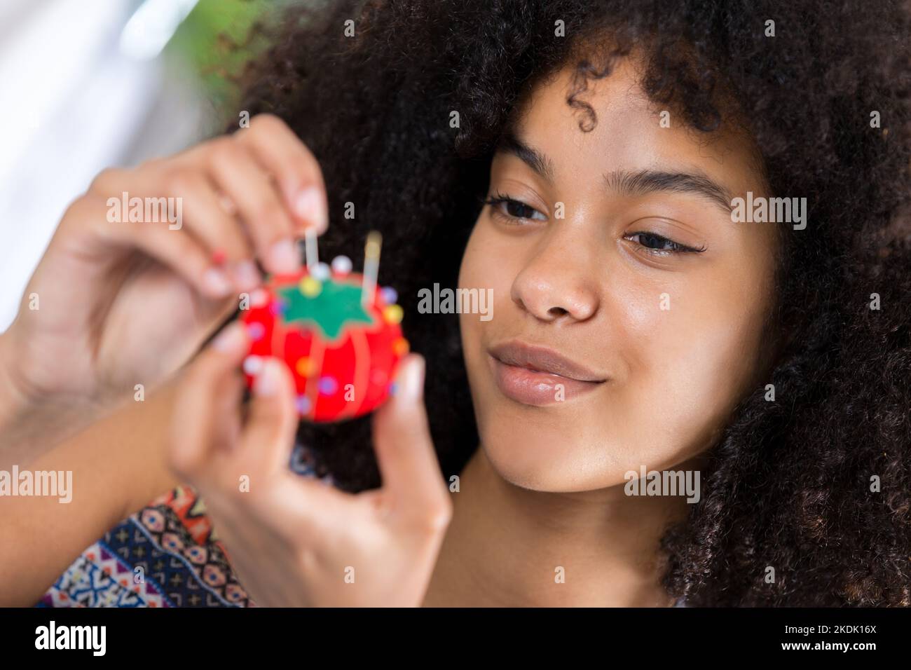 young female tailor pricking pins on the cushion Stock Photo - Alamy