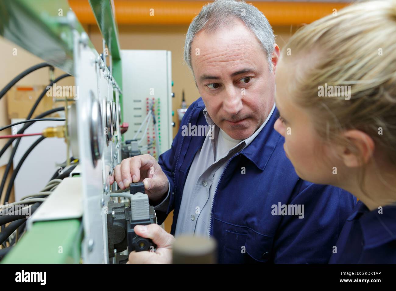 Listening to instructor hi-res stock photography and images - Alamy