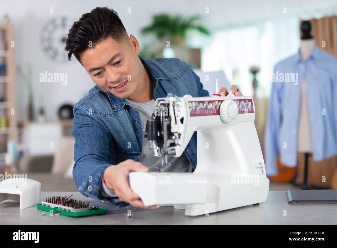 Indian man tailor machine hi-res stock photography and images - Alamy