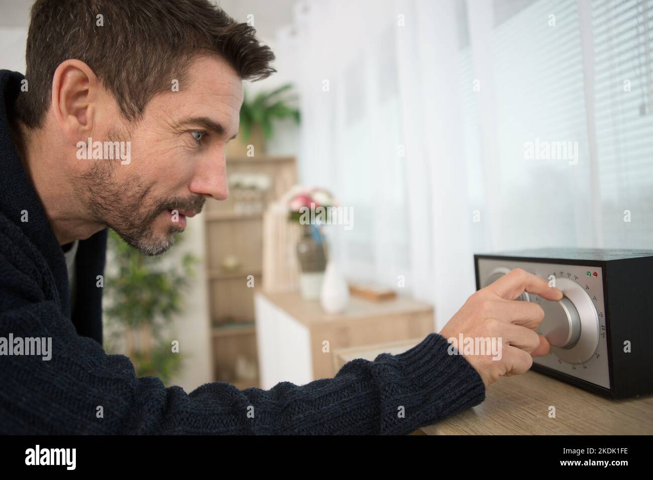 Person listening to transistor radio hi-res stock photography and ...
