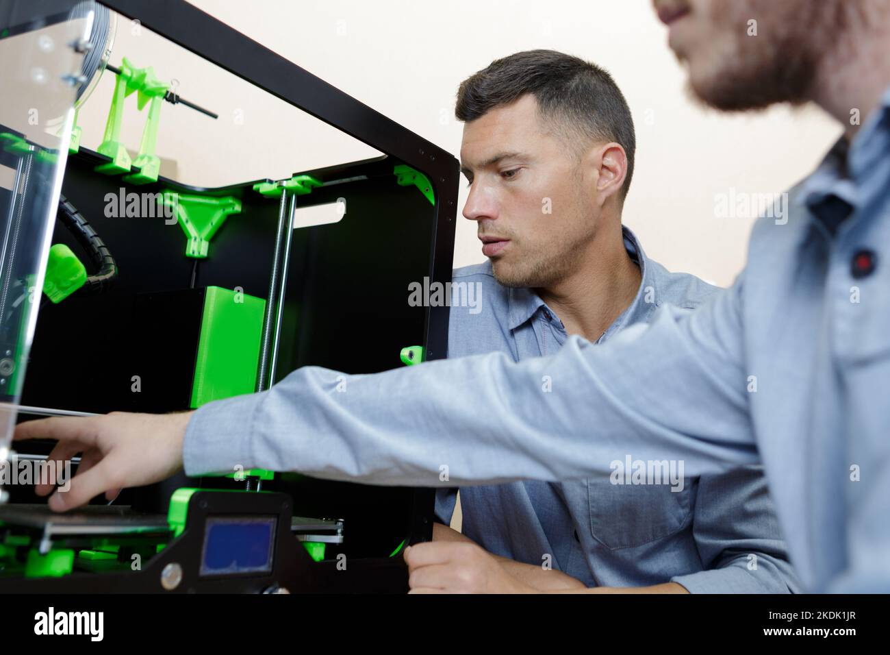 Male engineers work modern industrial hi-res stock photography and ...