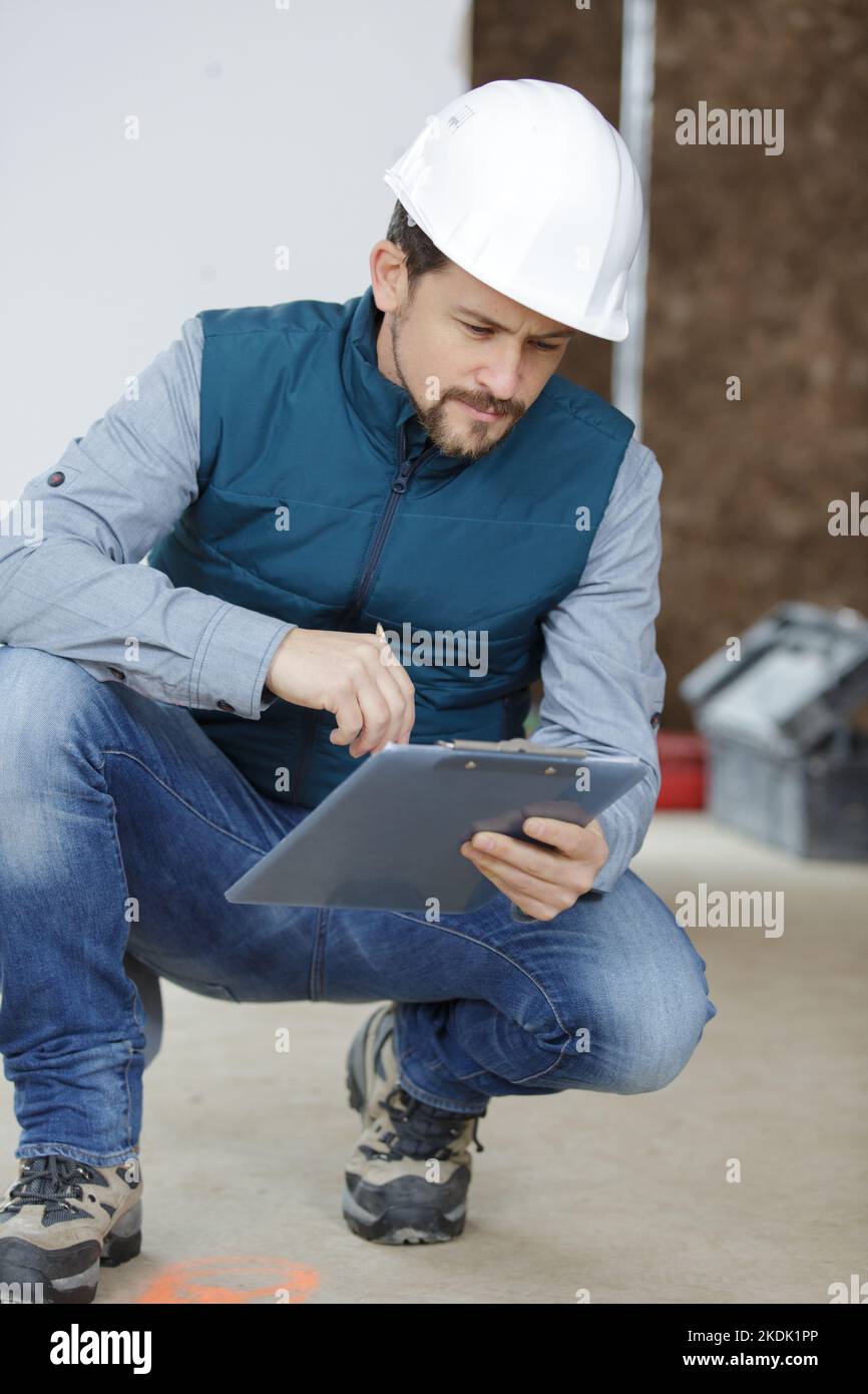 a casual employee with clipboard Stock Photo - Alamy