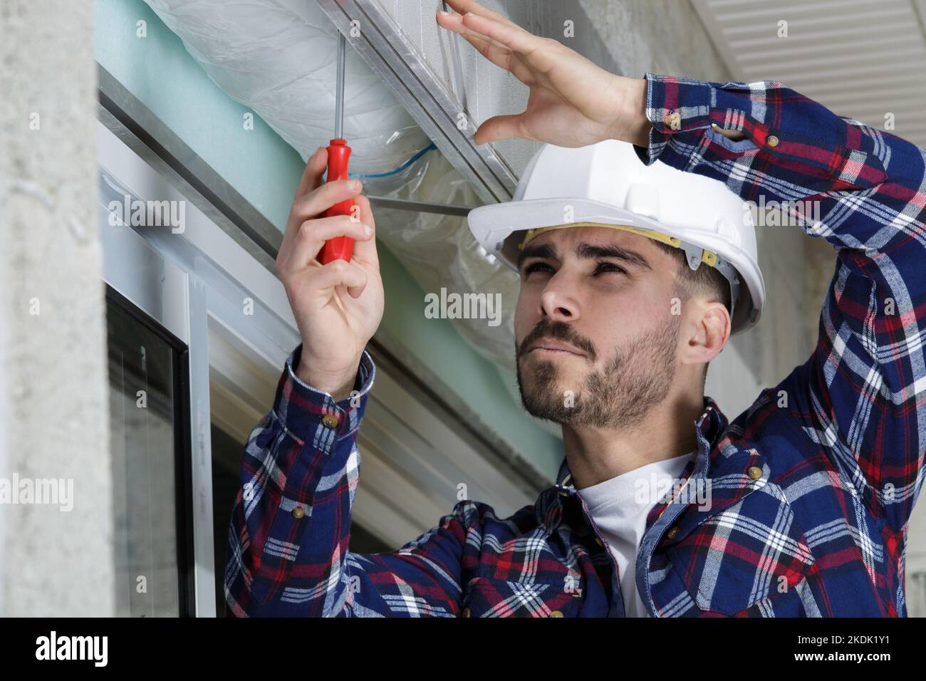 Worker repairs windows hi-res stock photography and images - Alamy