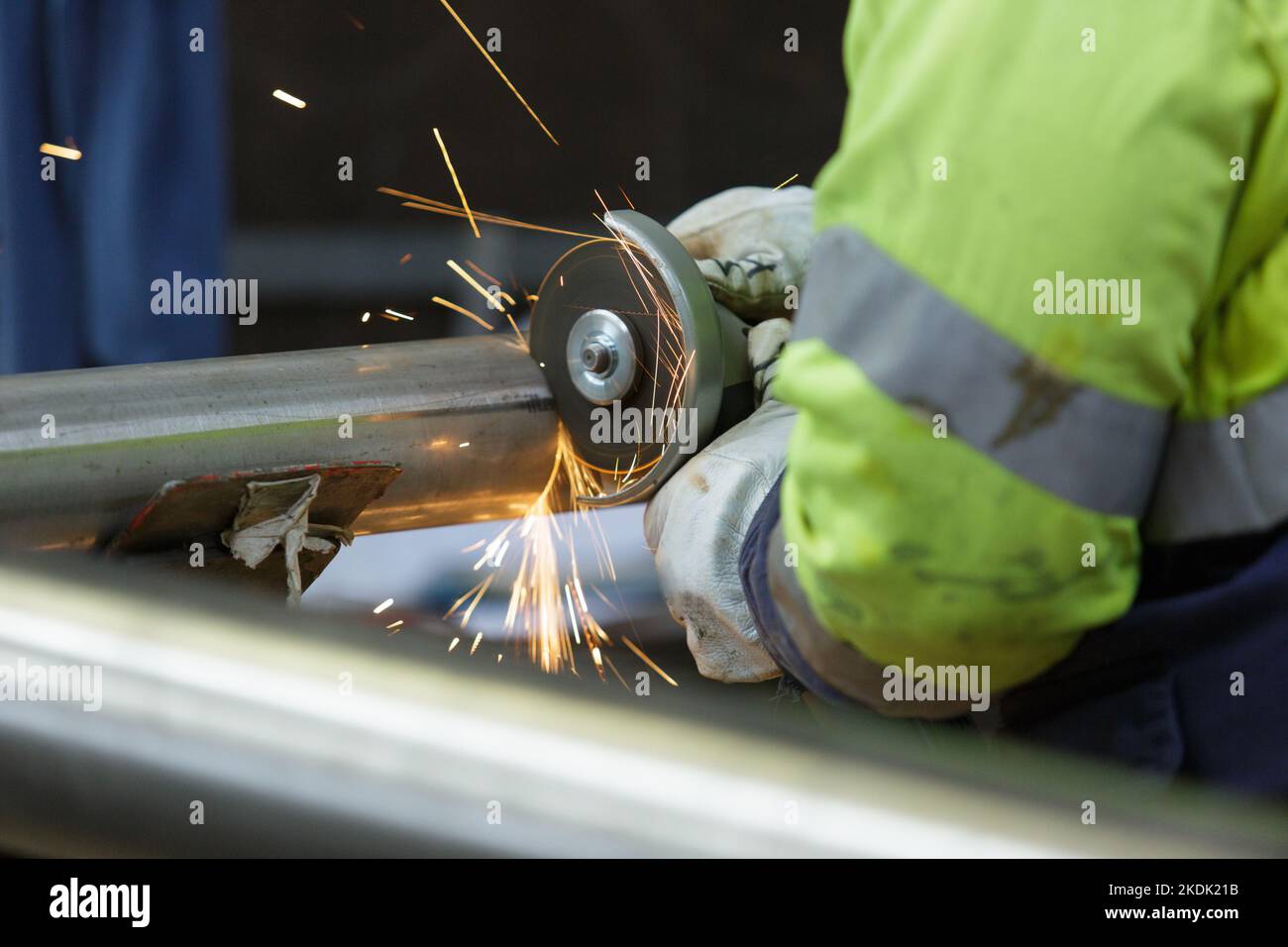hot sparks flying in the air from a metal grinder Stock Photo - Alamy