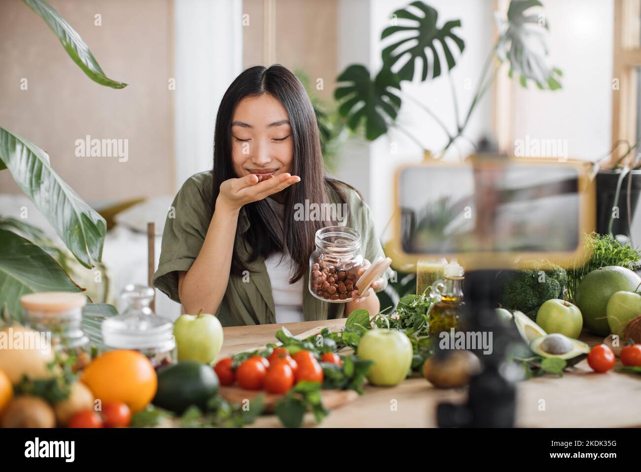 Exotic tropical healthy food concept. Beautiful smiling asian young ...