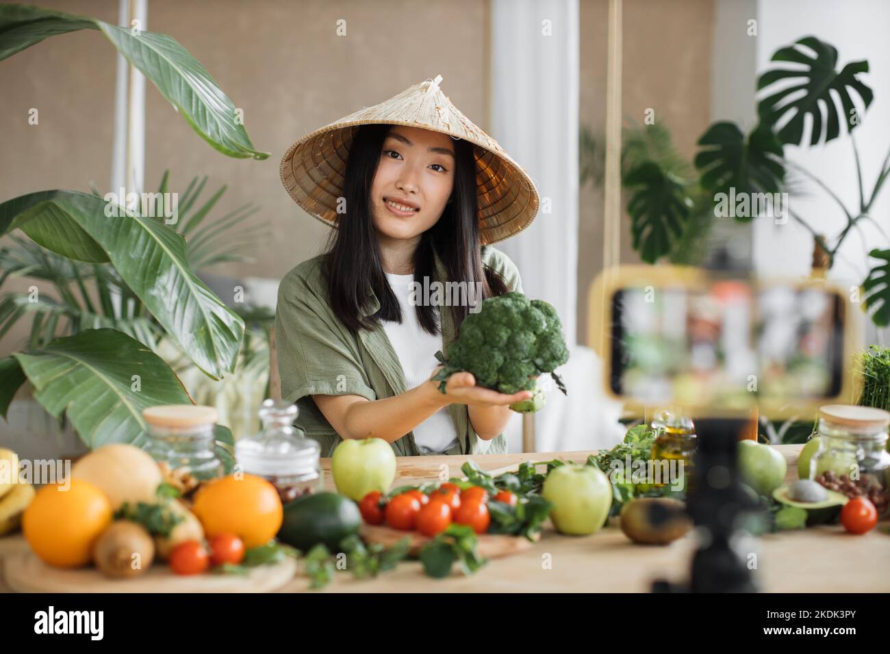Exotic tropical healthy food concept. Beautiful smiling asian young ...