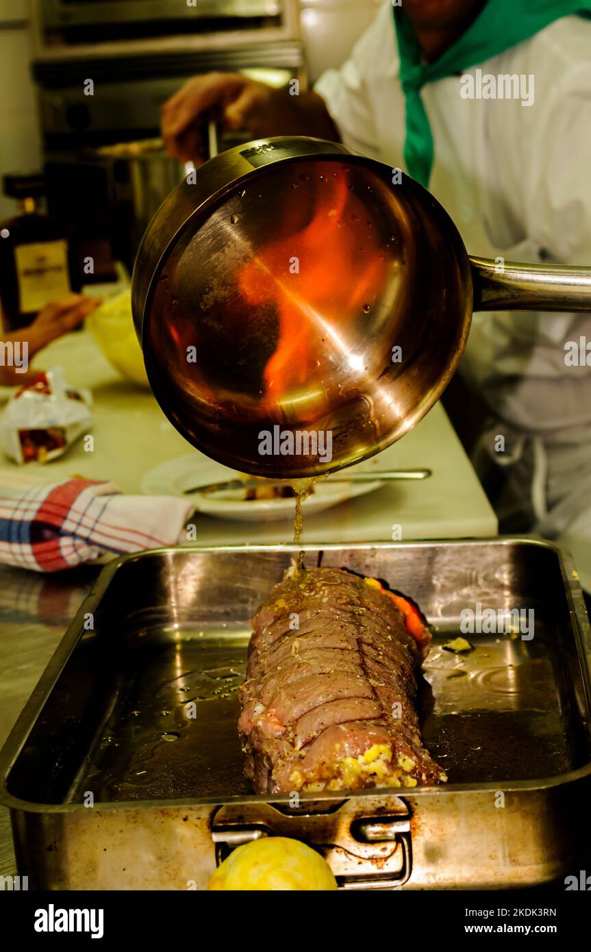 Flambeed with an exquisite roll of pork loin Stock Photo - Alamy