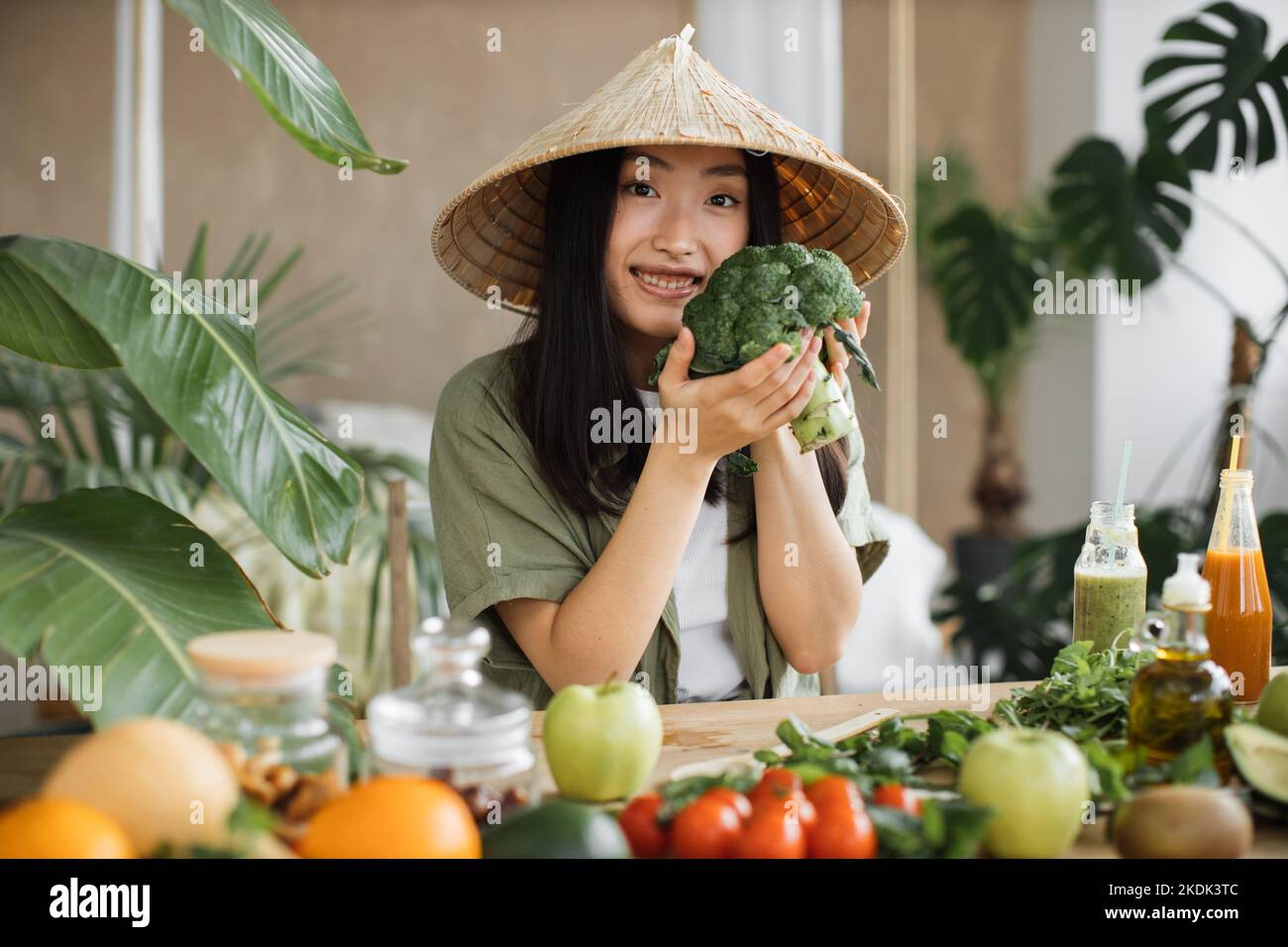 Exotic tropical healthy food concept. Beautiful smiling asian young ...