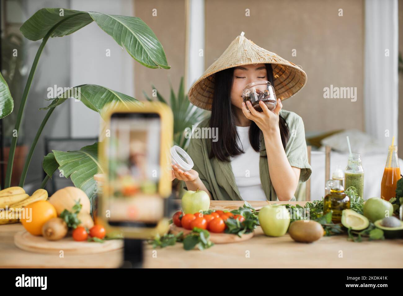 Exotic tropical healthy food concept. Beautiful smiling asian young ...