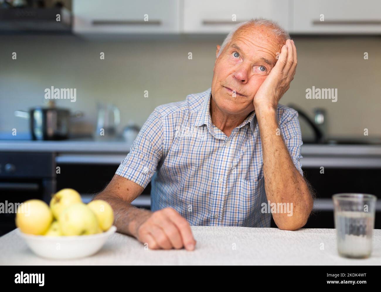 Thoughtful older man home hi-res stock photography and images - Alamy
