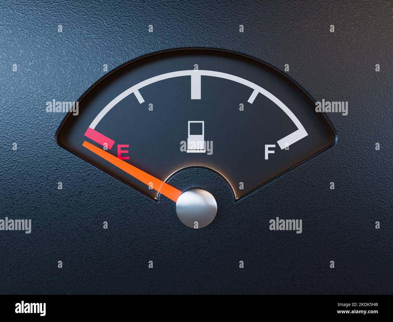 A closeup of a petrol gas gage showing the needle at empty on a dark ...