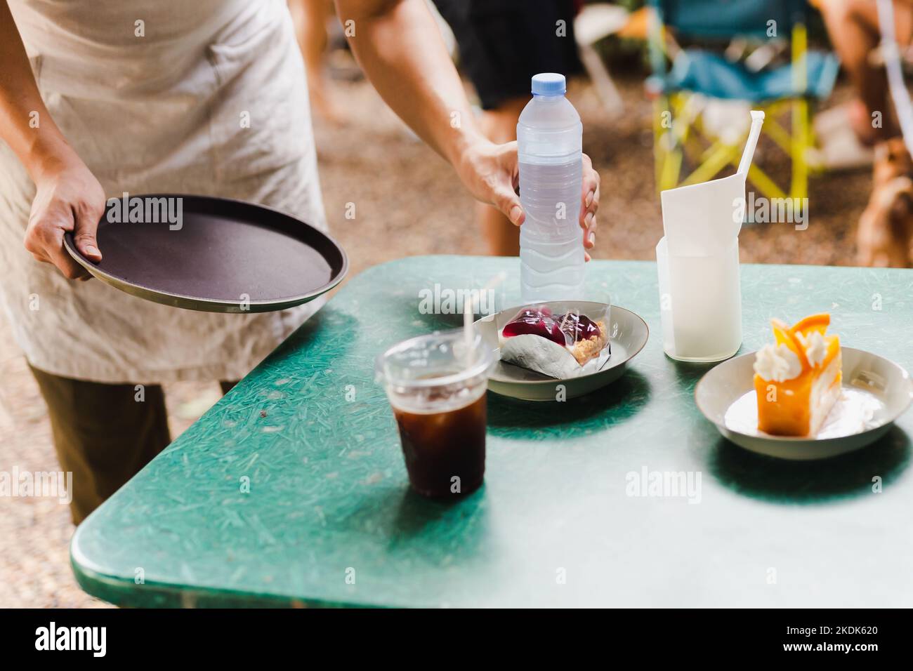 Waiter serving water in restaurant hi-res stock photography and images ...