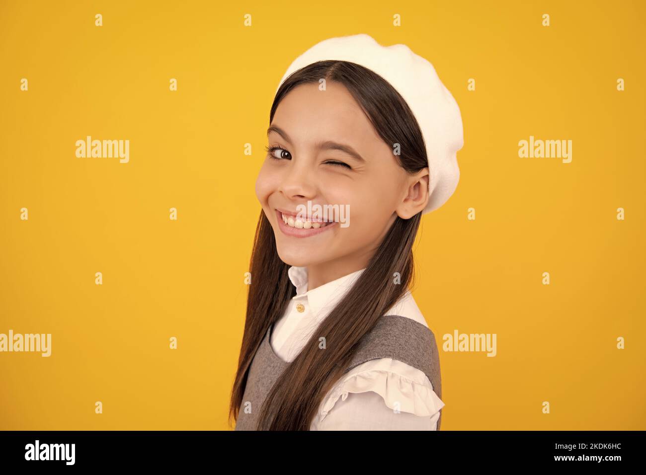 Funny kids winks face. Portrait of funny teenager child girl smiling ...