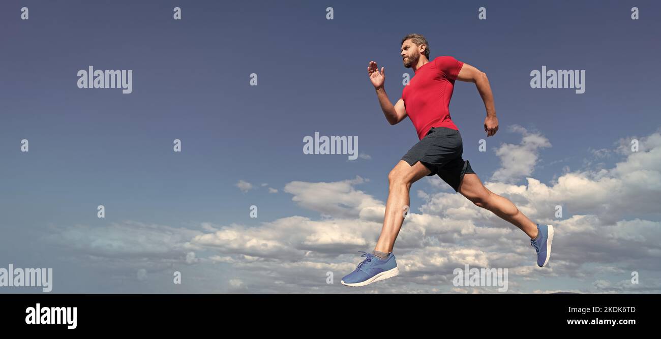 Man running and jumping, banner with copy space. challenge and ...