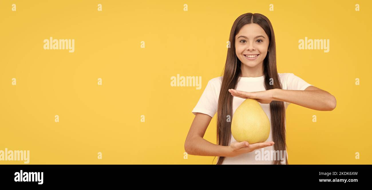 happy teen girl with pomelo citrus fruit. vitamin and dieting. Child ...