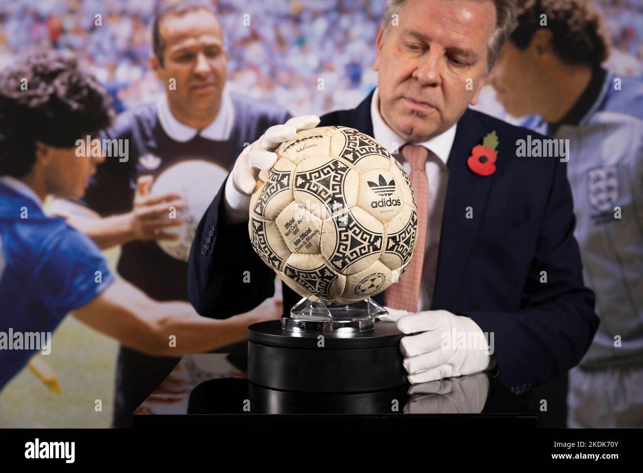 EDITORIAL USE ONLY Auctioneer Graham Budd at an event at Wembley ...