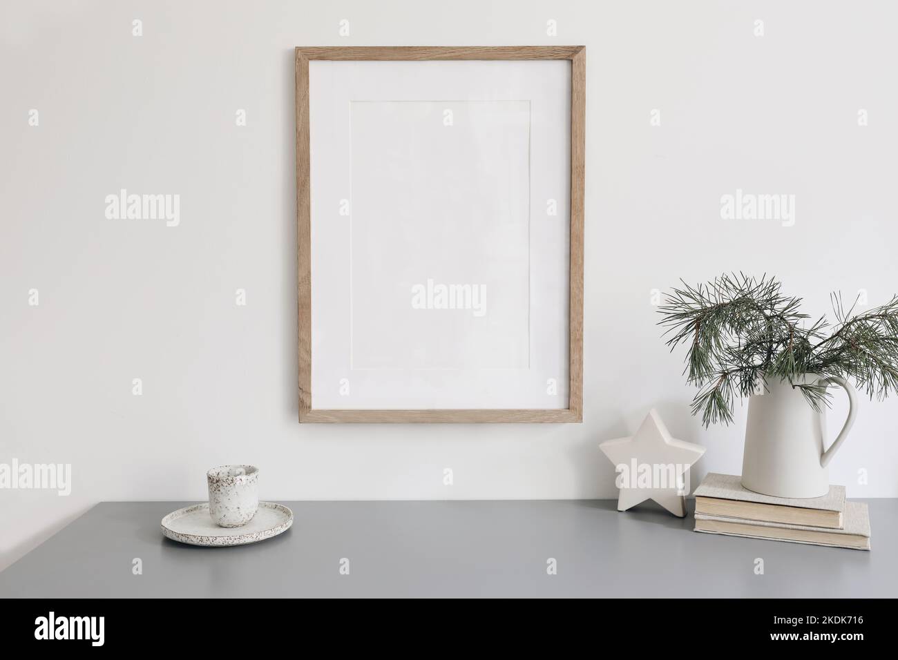 Christmas still life. Blank wooden picture frame mockup. Cup of coffee ...