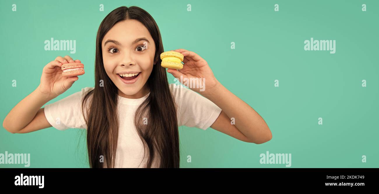 amazed kid hold french macaron or macaroon cookies, sweet life ...