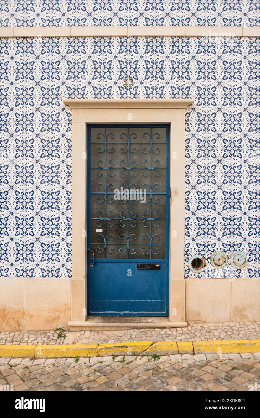 Typical Portuguese traditional design front door to property, Tavira ...