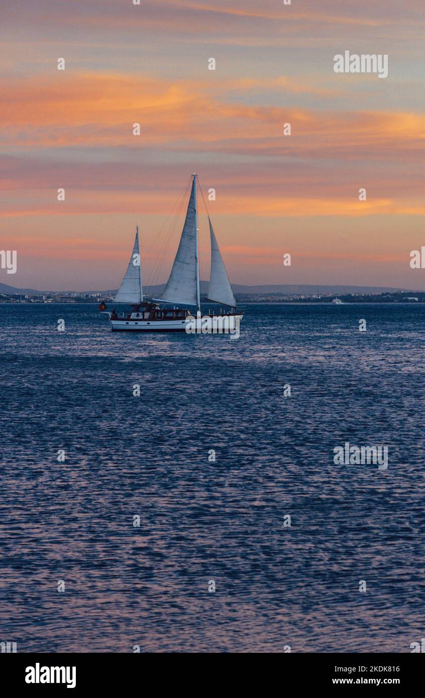Luxury saiboat on Tagus river at sunset in Lisbon, Portugal Stock Photo ...