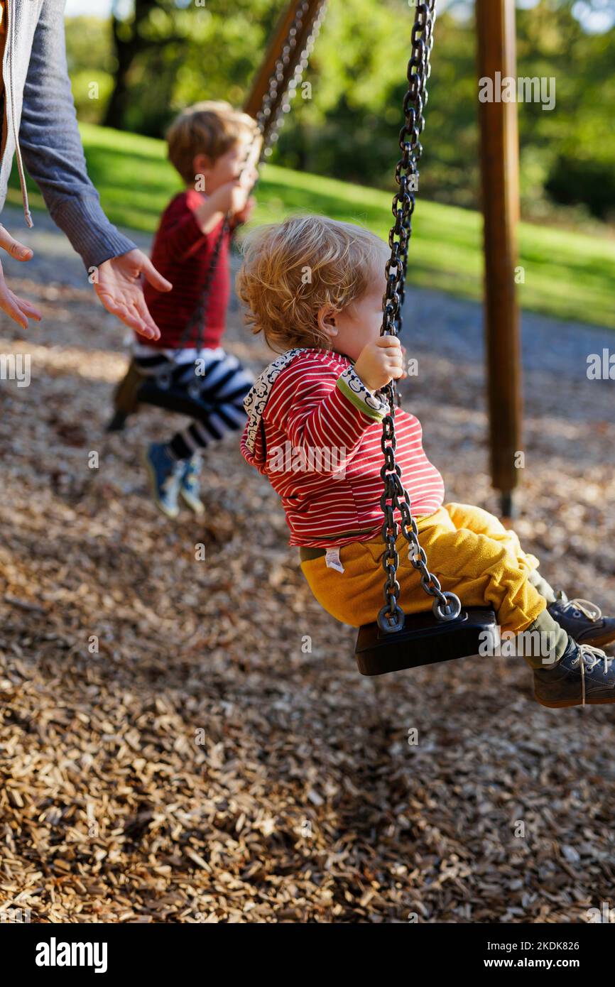 Bonn, Deutschland. 04th Oct, 2022. Children on a swing. Copyright: Ute ...
