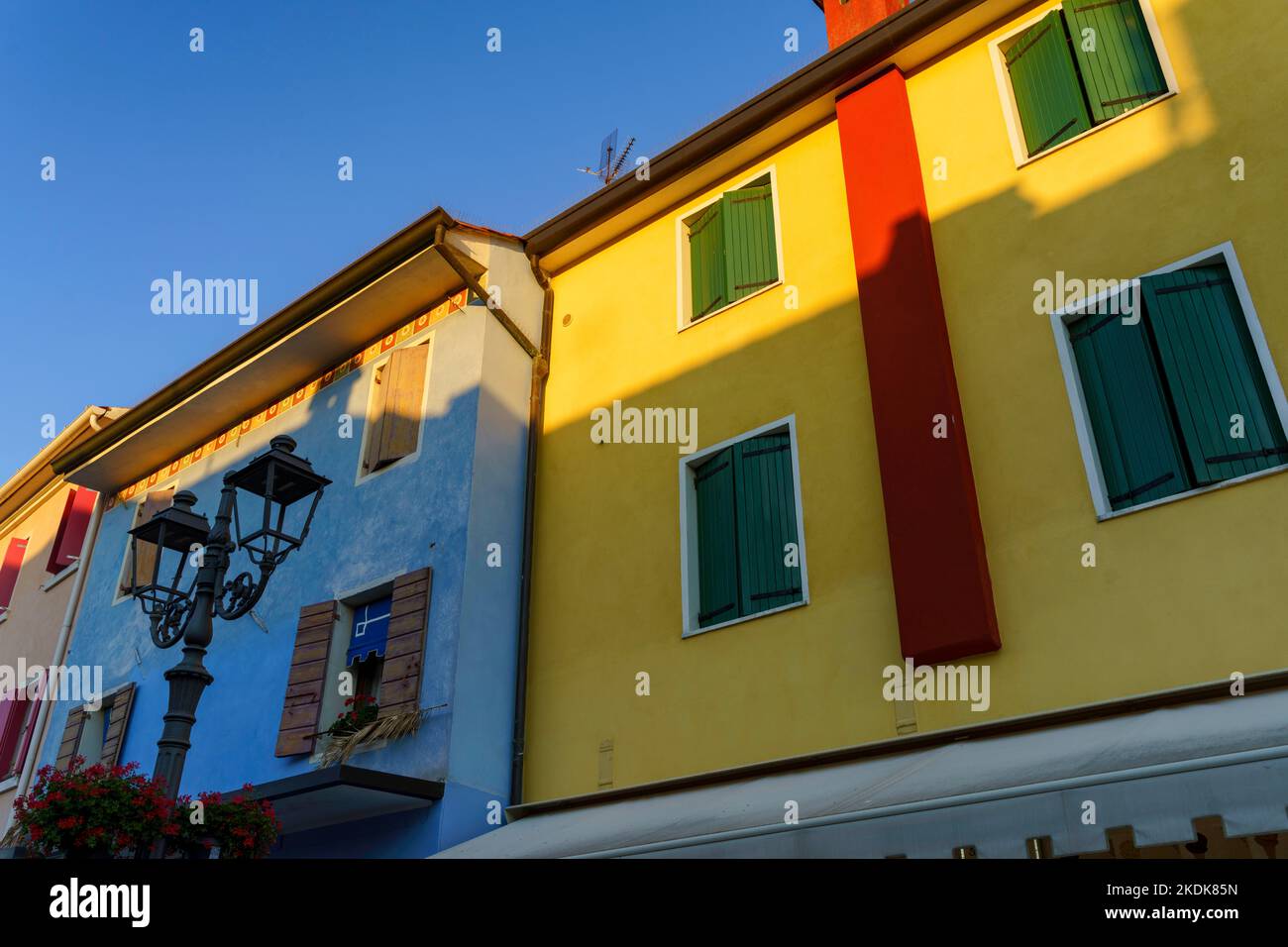 Typical colorful houses of Caorle, in Venice province, Veneto, Italy ...