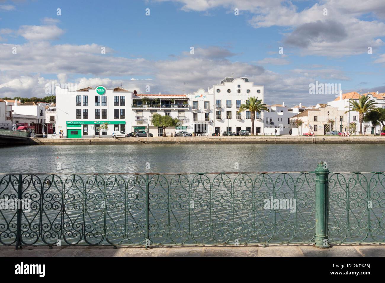 View of River Gilao with whitewashed buildings, Tavira, Algarve ...