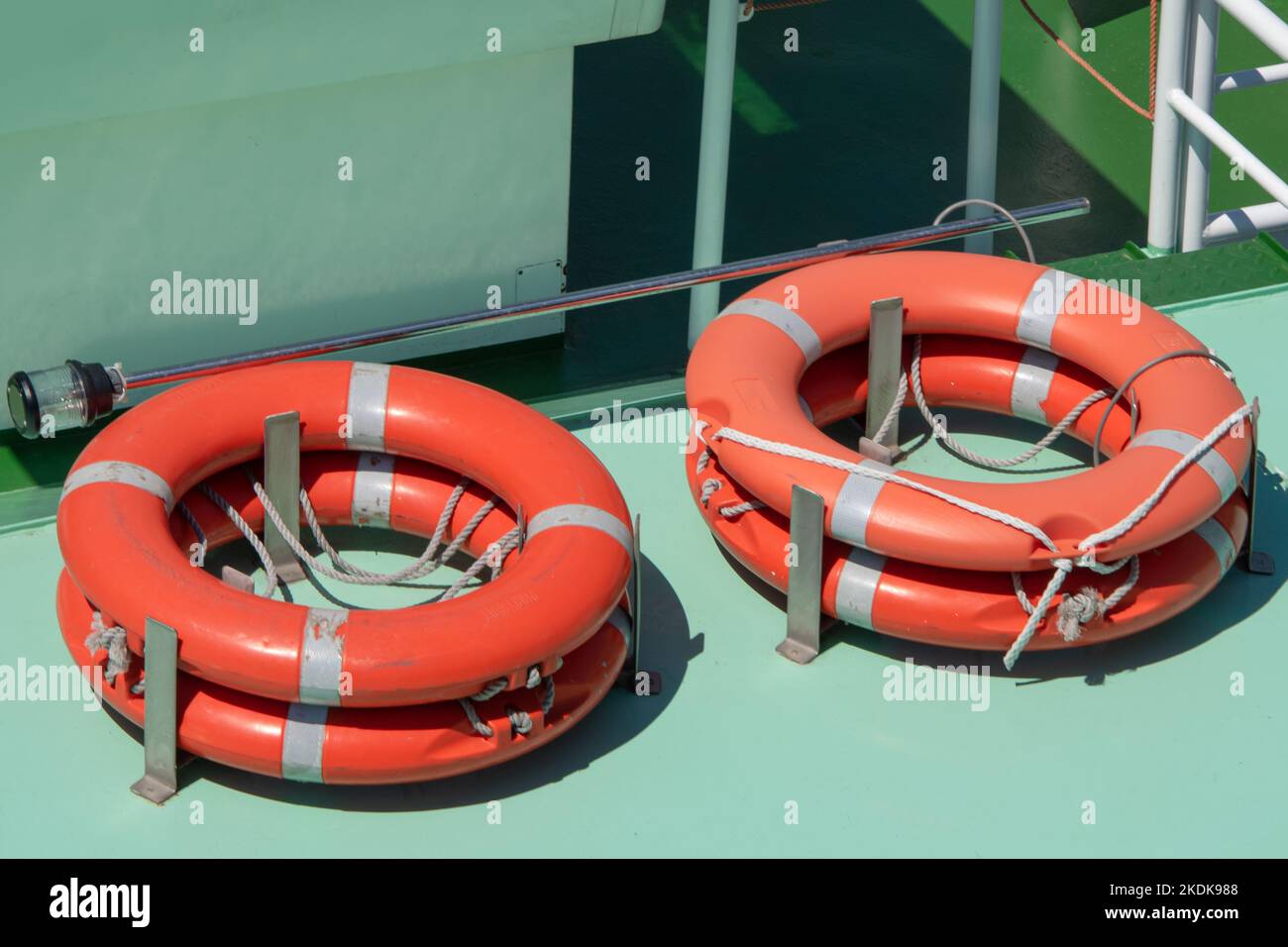 Orange lifebuoy at the boat, lifeguard float. Lifeguard equipment, life ...