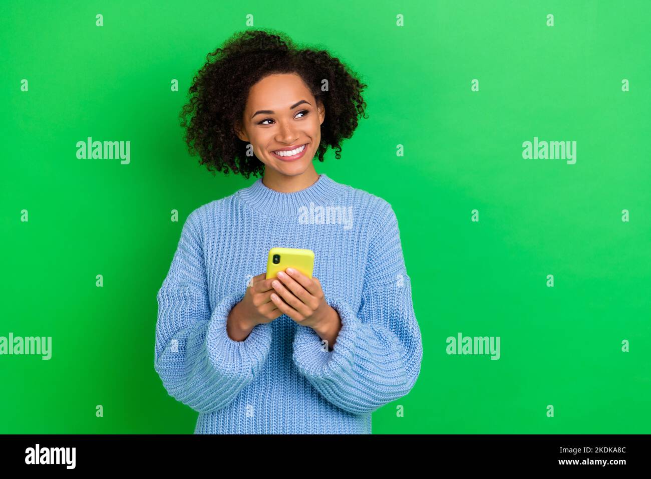 Photo of funky wavy brunette lady look empty space hold telephone wear ...