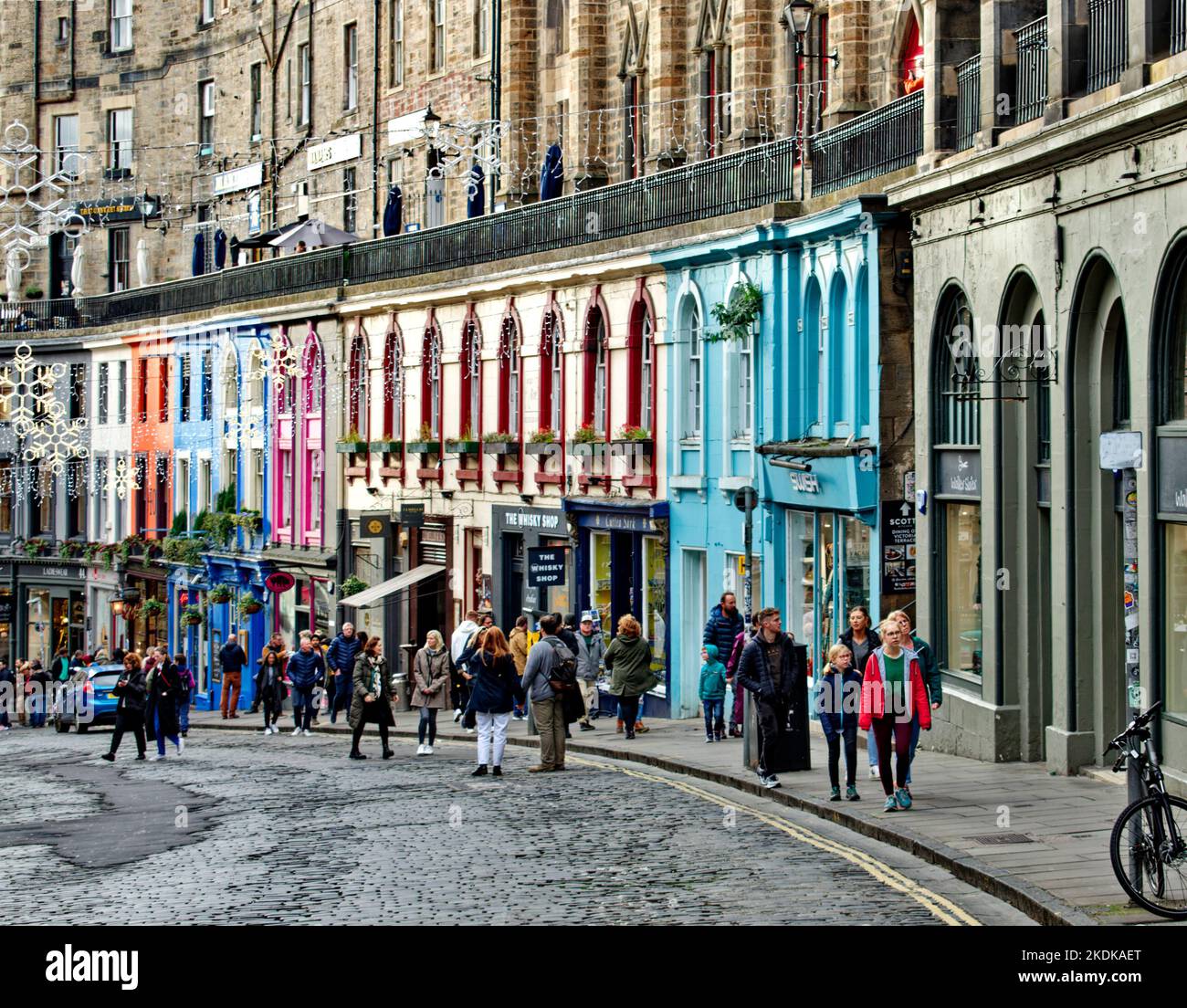 Edinburgh Scotland Victoria Terrace with coloured shop fronts and ...