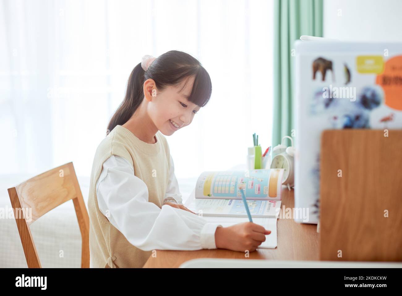 Japanese kid studying at home Stock Photo - Alamy